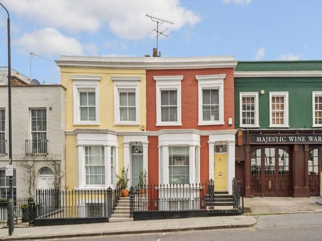 A beautiful period house offering elegant accommodation and a private terrace set on one of Kensington’s most sought‑after residential streets