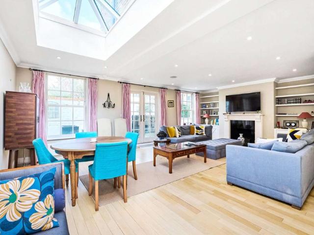 A beautiful semi detached mews house with off street parking and garden