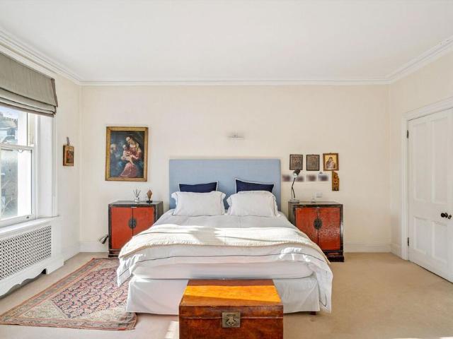 A beautifully arranged family home with grand proportions, for let in a desirable Chelsea street in SW10