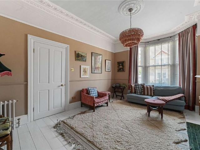 A beautifully arranged four bedroom family home of approximately 2,000 sq ft with a private garden