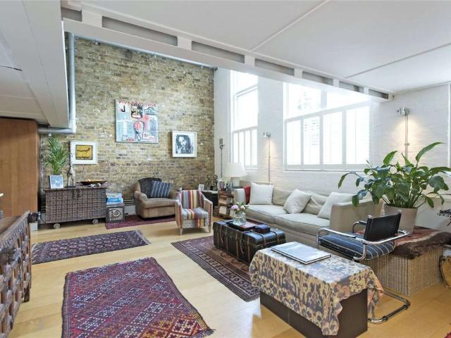 A beautifully designed two bedroom loft style apartment set within this stylish converted Victorian school