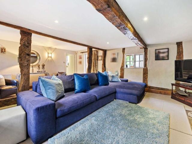 A beautifully extended thatched country home set within 2.18 acres of south facing grounds, offering 4,311 sq ft of characterful accommodation & a self contained annexe