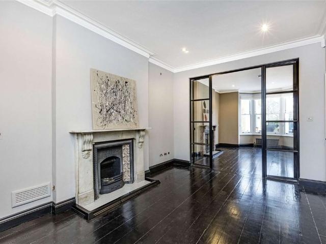 A beautifully finished four bedroom family home moments from the River Thames