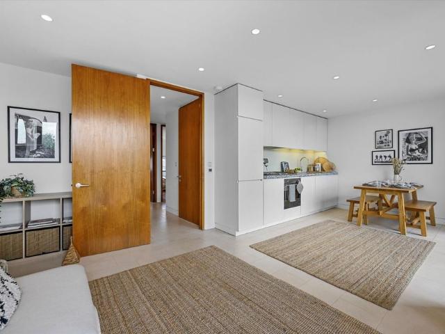 A beautifully interior designed apartment, featuring floor to ceiling windows with outside space