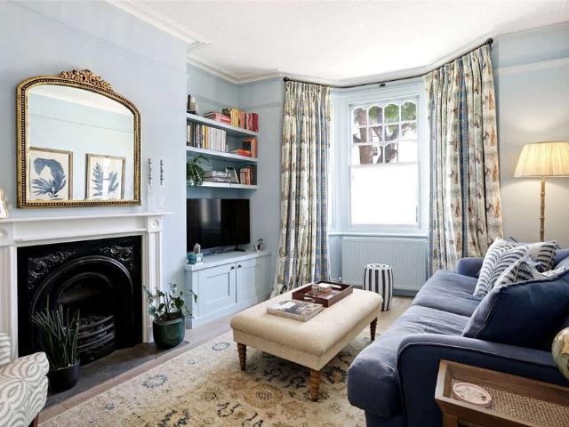 A beautifully presented terraced house sympathetically extended with a secluded west facing courtyard garden