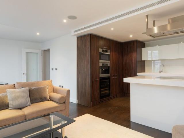 A beautifully presented three double bedroom apartment with balcony in a secure development with concierge service on the River Thames close to Sloane Square and Victoria Stations