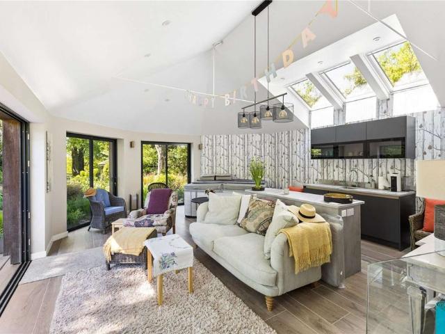 A beautifully presented character home with versatile accommodation in a private, gated position