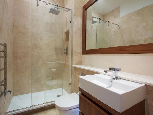 A beautifully presented first floor apartment with high ceilings and a west facing balcony