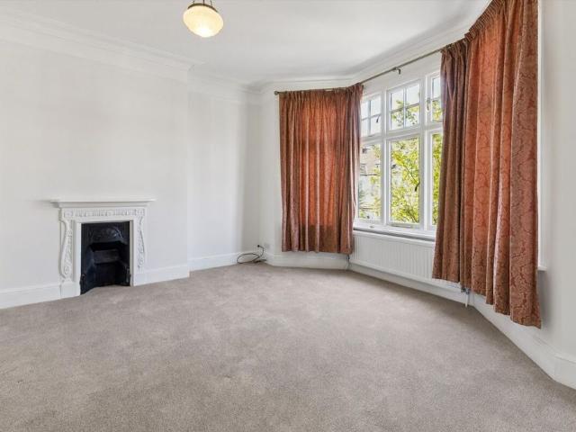 A beautifully presented four bedroom family home arranged over three floors, offering generous living space and a practical layout throughout