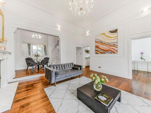 A beautifully presented split level apartment with its own private entrance, private terrace and access to a communal garden in the heart of Belsize Park NW3