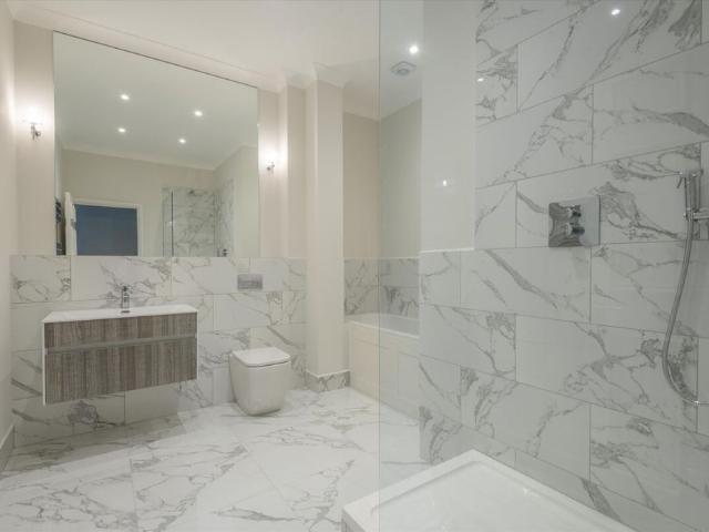 A beautifully refurbished second floor lateral apartment with off street parking, balcony, communal gardens and a lift is available to rent through Knight Frank NW3