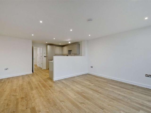A brand new two bedroom apartment with off street parking offering light, modern interiors in a sought after location