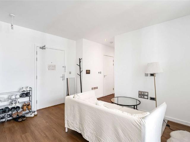 A bright three bedroom apartment with a private balcony