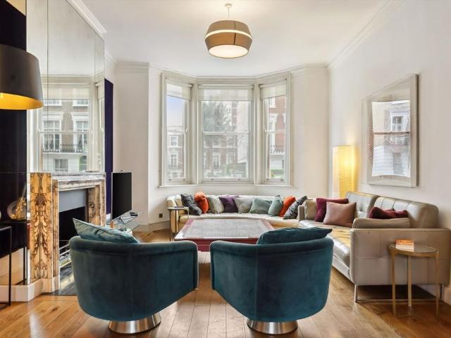 A bright and beautifully arranged two bedroom apartment with a private garden in the heart of Chelsea
