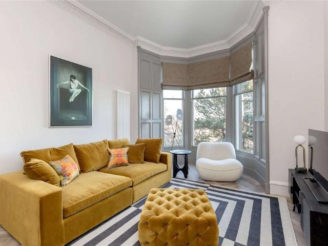 A bright and spacious two bedroom first floor apartment with designer interior. The apartment is presented to the market in excellent condition