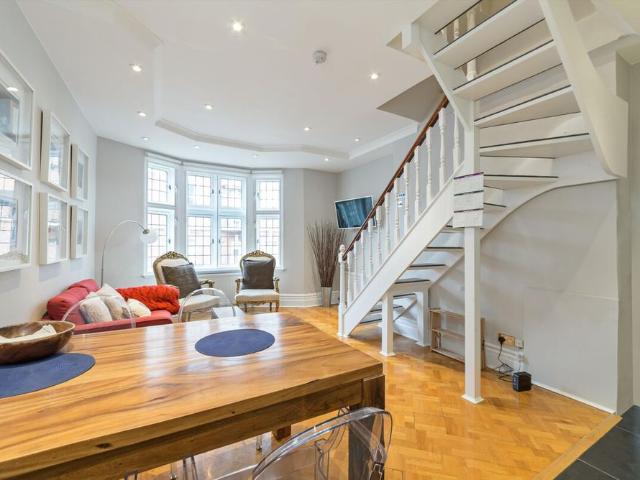 A bright and well presented duplex apartment in a desirable South Kensington mansion block with lift access
