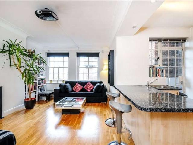 A bright & spacious second floor apartment in this sought after mansion block, in the heart of Hampstead village