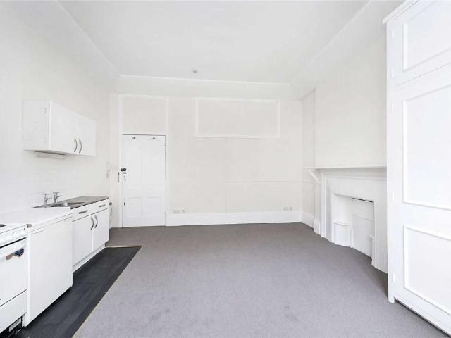 A brilliant ground floor studio with its own kitchenette and shower room, with shared toilet facilities, on a desirable street in South Kensington