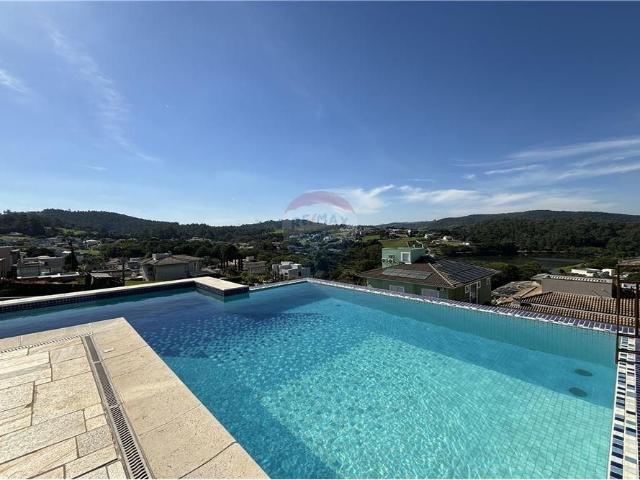 A casa com vista pro lago Residencial Villagio Paradiso, Itatiba/SP