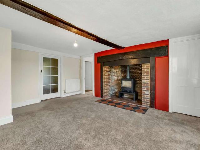 A charming and beautifully refurbished detached farmhouse set within mature grounds on Flexcombe Lane, Liss