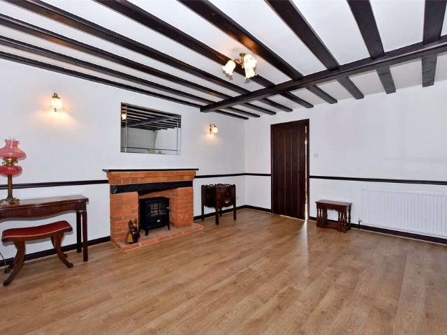 A charming end of terrace cottage enjoying a tucked away position in a peaceful setting, while remaining conveniently located for local amenities