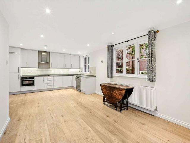 A charming two bed and two bath apartment in gated development
