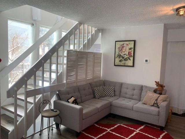 A clean furnished room in a quiet house