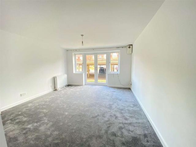 A contemporary apartment forming part of a modern development set in vibrant Crawley