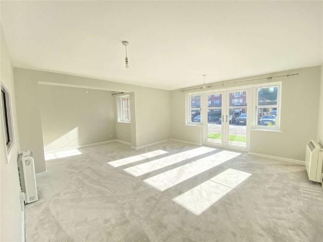 A contemporary apartment forming part of a modern development set in vibrant Crawley