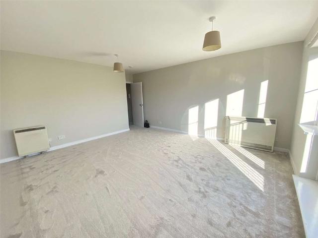 A contemporary apartment forming part of a modern development set in vibrant Crawley