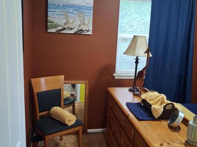 A Cozy Room with Queen Sized Bed