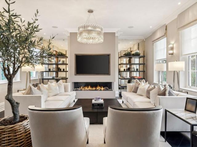 A detached five bedroom family home set in mature, landscaped gardens of approximately around half an acre available to let in the coveted Crown Estate