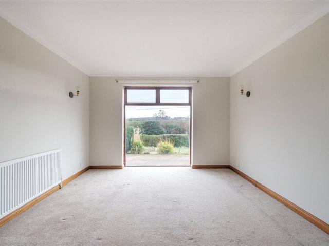 A detached 1970s 4 bedroom bungalow
