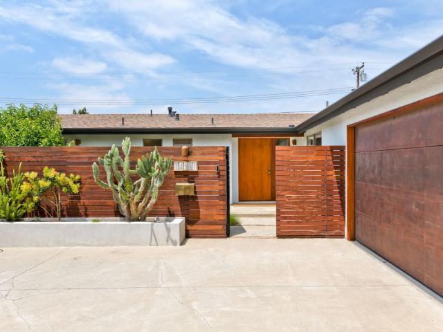 A Fully Furnished Modern Portfolio Home with a Large Backyard Oasis & 3 Comfortable Bedrooms!