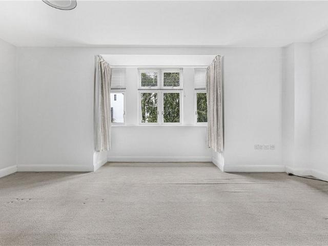 A five bedroom detached home with enclosed rear garden and off street parking
