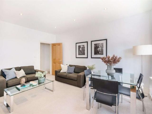 A fourth floor two bedroom apartment located within a secure period building