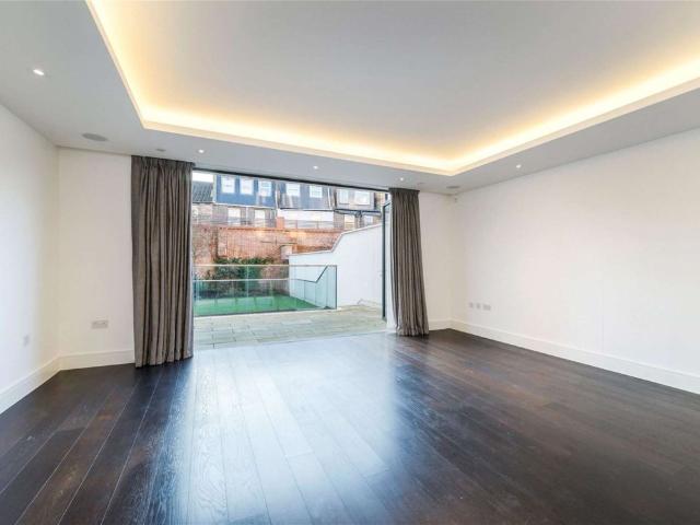 A four bedroom townhouse within London Square Fulham, Fulham's first garden square development, with accommodation arranged over 5 floors