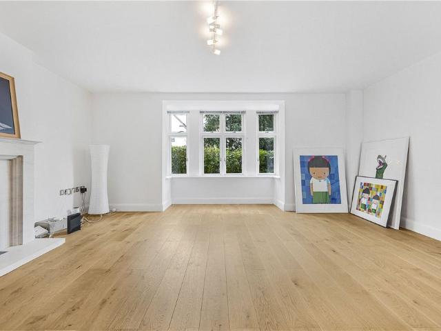 A four bedroom detached home with enclosed rear garden and off street parking