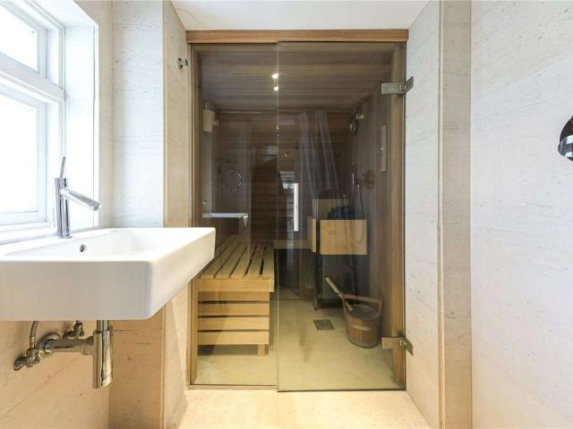 A four bedroom semi detached family home conveniently located to American School in London