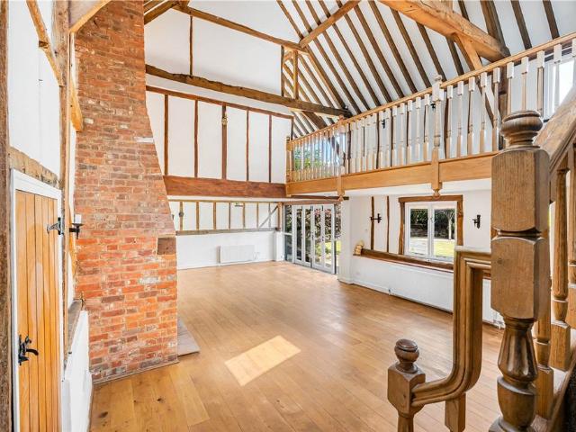 A Grade II listed three bedroom barn conversion with a one bedroom annexe, garage and driveway parking in Chalfont St Giles