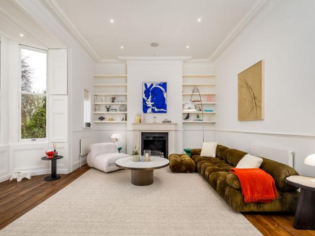 A handsome five bedroom townhouse with a large garden in W2
