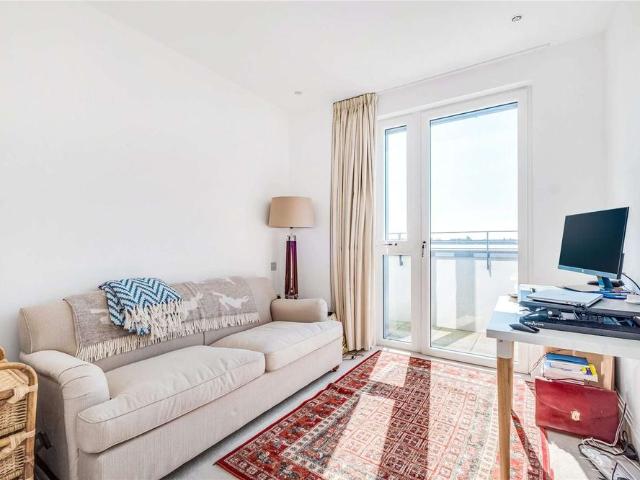 A luxury 3 bedroom apartment on the fourth floor of this contemporary riverside development