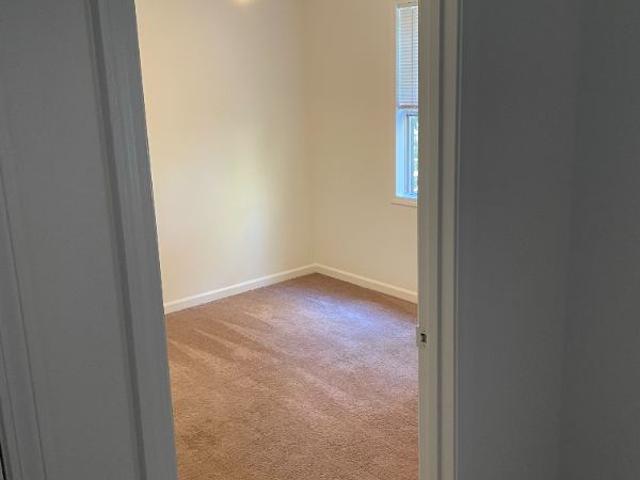 A private BEDROOM with a shared bath and kitchen
