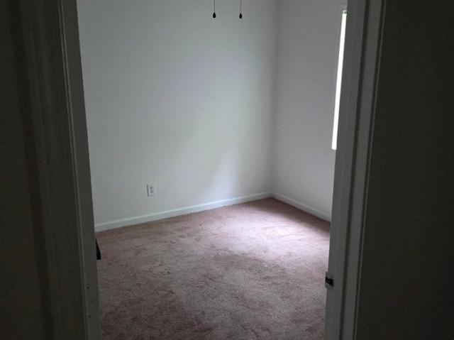 A private BEDROOM with a shared bath and kitchen