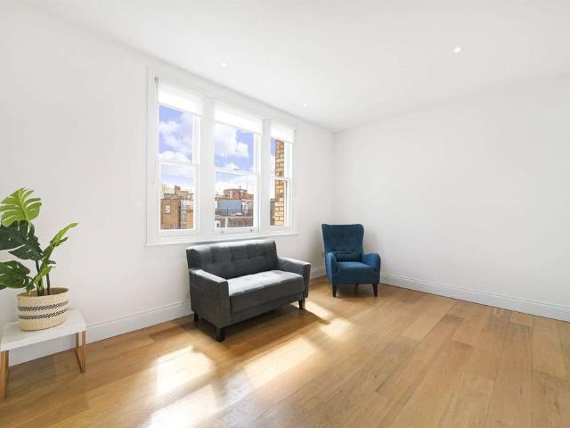 A recently refurbished and generously proportioned one bedroom apartment on the fourth floor of this well maintained period conversion