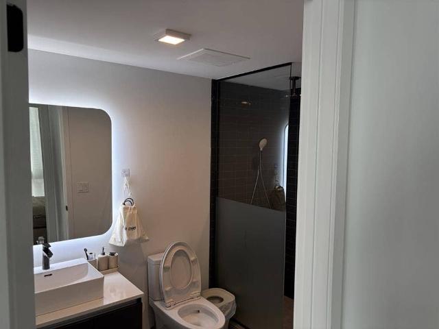 A room in a 1 bedroom apartment