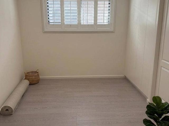A room with separate bathroom