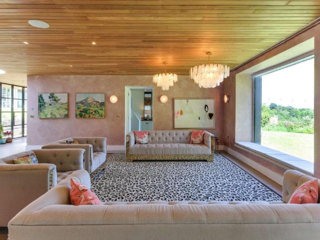 A striking and beautiful former oast and barn, set in an elevated rural position with far reaching views