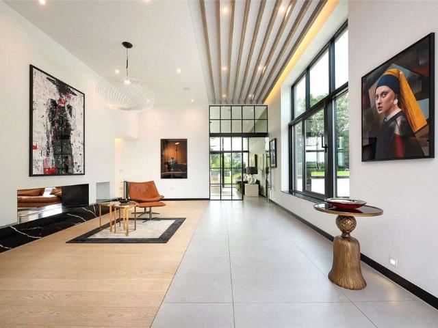 A striking contemporary residence, with luxury and sustainability in mind, set in beautifully landscaped grounds of about 1.5 acres