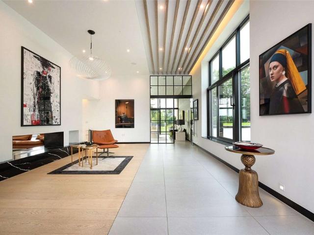 A striking contemporary residence, with luxury and sustainability in mind, set in beautifully landscaped grounds of about 1.5 acres